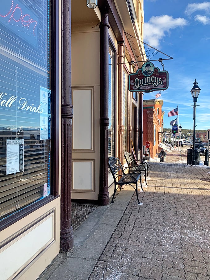 Quincy's (exterior sign): "That vintage sign isn't just advertising&mdash;it's a time machine to when steakhouses knew exactly what they were about."