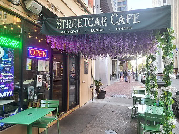 Streetcar Caf&eacute;'s wisteria-draped entrance whispers sweet promises of pancakes worth setting your alarm for.