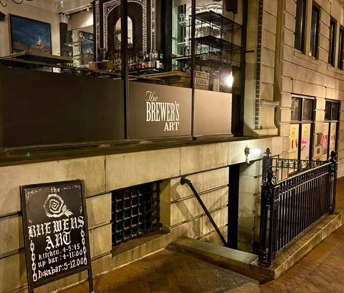 The Brewer's Art's elegant facade hides two worlds: upscale dining upstairs and a cavernous beer lover's paradise in the basement.