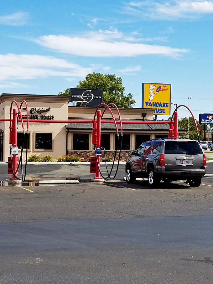 Those iconic red arches say "pancake royalty resides here." The gas pumps nearby provide fuel, but the real energy comes from inside!