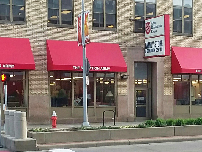 The Salvation Army's classic brick building and red awnings have sheltered generations of bargain hunters from both rain and retail prices.