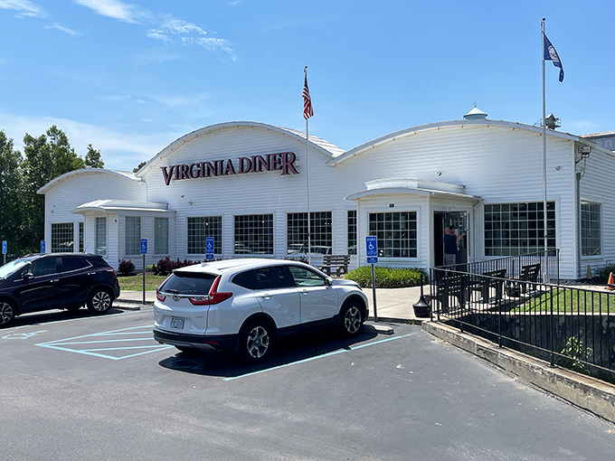 Virginia Diner's gleaming white exterior with its curved roof stands like a beacon of Southern comfort food.