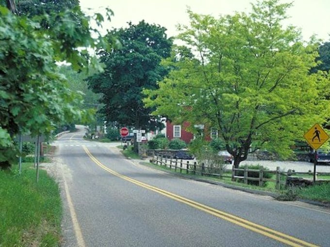 Lush greenery and quiet country roads invite you to explore the scenic beauty and peaceful charm found throughout lovely Woodstock.