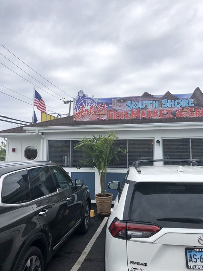 That classic vertical "CLAM BAR" sign has been catching eyes on 21st Street longer than most restaurants have been open.