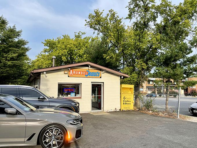 That modest "OPEN" sign is all the advertising needed when your donuts have already made you a neighborhood legend.