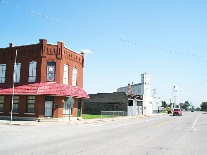 That oil derrick on Braman's sign tells you everything about this town's roots, while the modest buildings tell you about its heart.