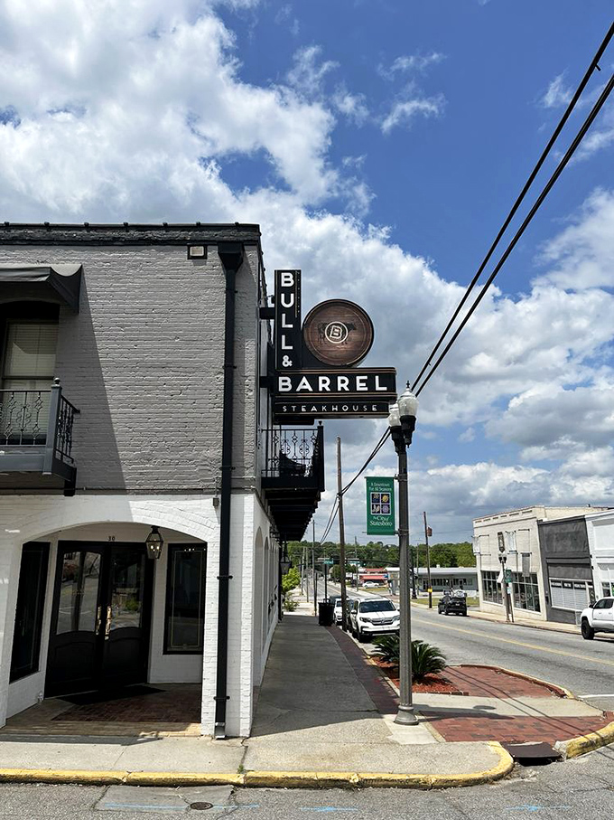 Downtown charm meets carnivore heaven at Bull & Barrel, where that white brick exterior hides beefy treasures.