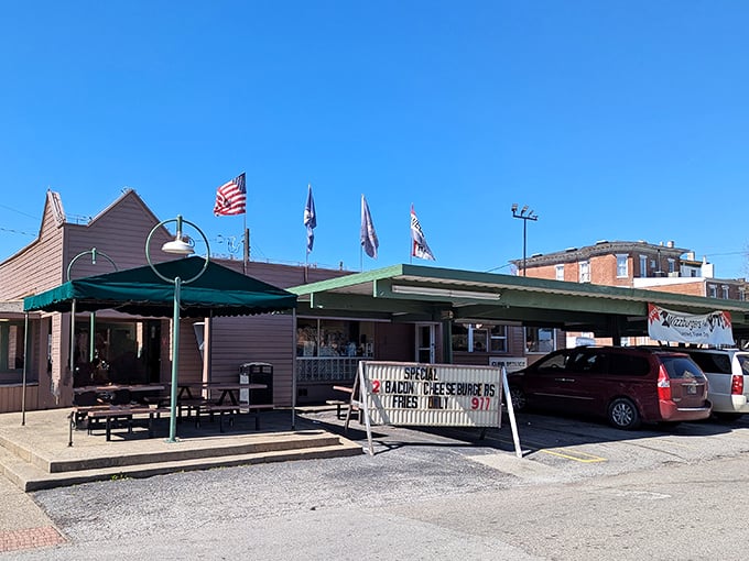 The classic drive-in setup at Dizzy Whizz isn't retro by design—it's authentic by survival, and those Whizzburgers are why.