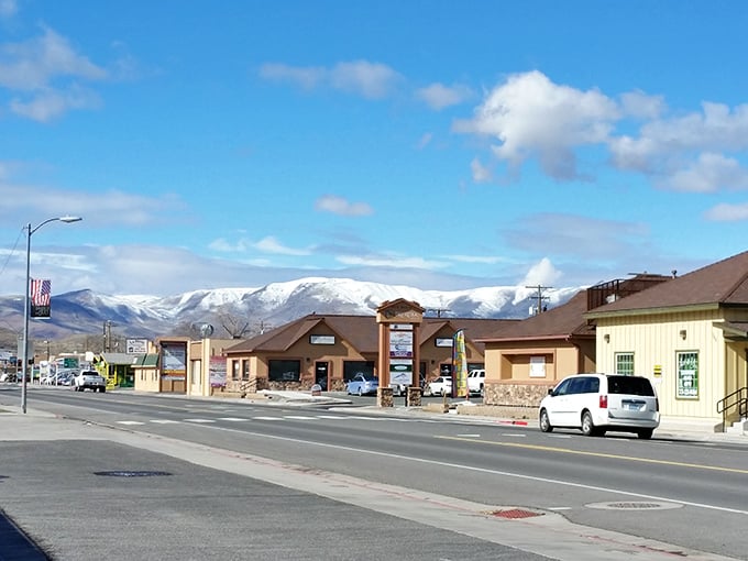 Snow-capped mountains watch over Fernley's storefronts &ndash; nature's skyscrapers in the high desert landscape.