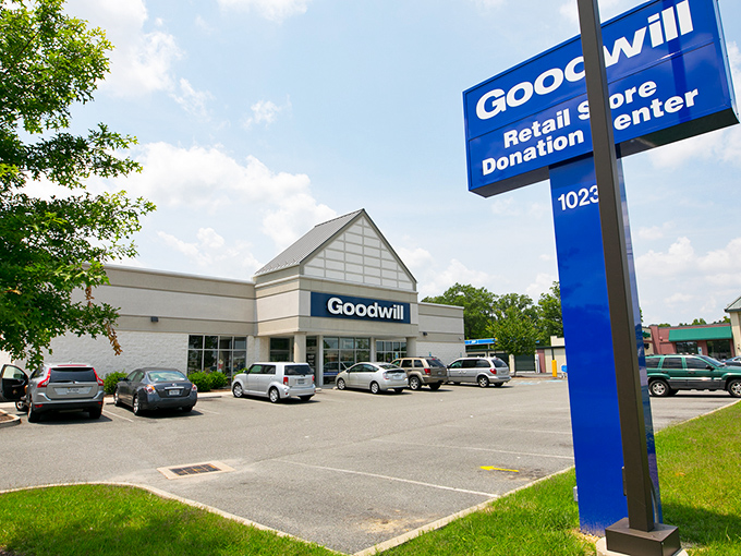 The Goodwill sign stands tall, a beacon of hope and bargains. Where retail therapy meets actual therapy for the community!