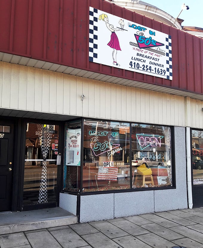 The checkered pattern and vintage waitress silhouette announce that you're about to time-travel to when calories were just numbers.