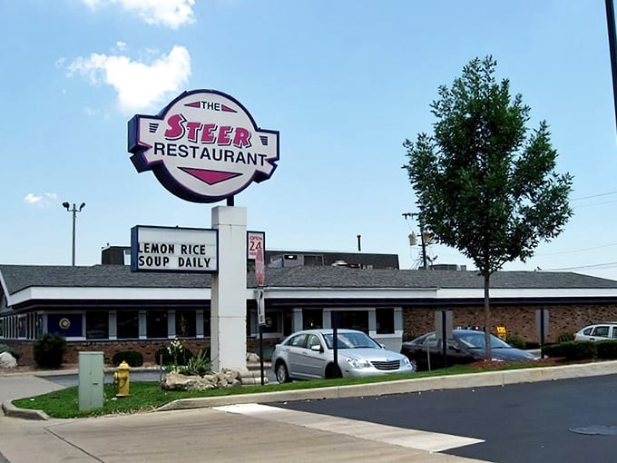 Purple Steer Restaurant (Highland): Beneath this iconic sign, lemon rice soup legends are born and comfort food traditions are passed to new generations.