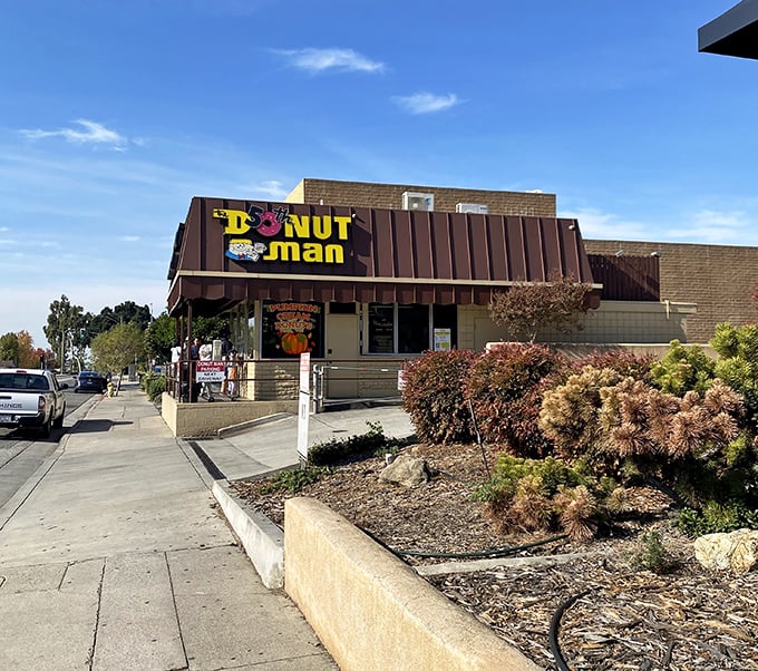 Route 66 gets sweeter! The Donut Man's charming exterior hints at the fruity wonders waiting inside.