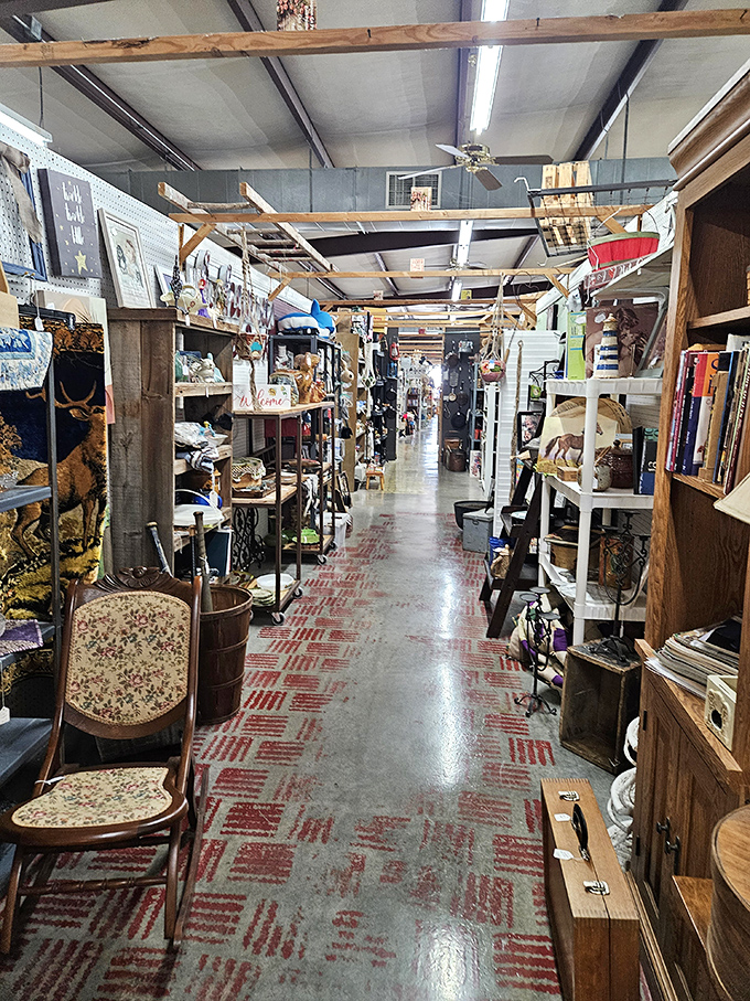 Wooden beams frame pathways through Tontitown's collections. That chair in the foreground? It's seen more family dinners than Thanksgiving itself!