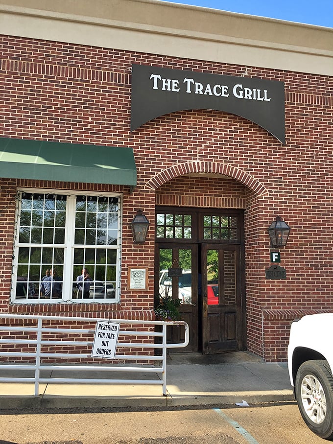 That simple sign doesn't need to shout&mdash;the sizzle of their grill and the aroma of those famous burgers does all the talking. 