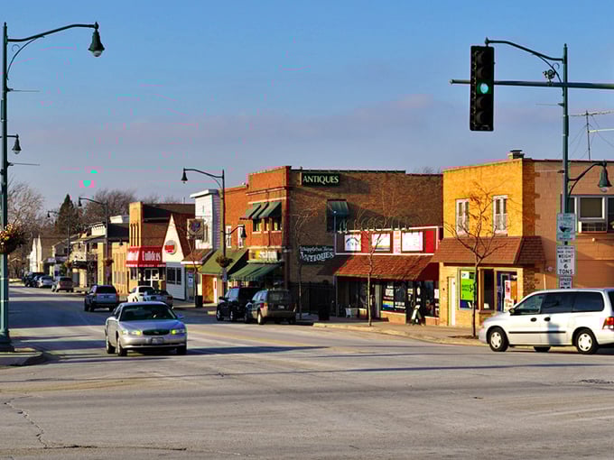 Wauconda's main street shops bask in golden hour light, the kind of place where the ice cream shop owner remembers your favorite flavor.