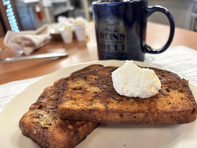 Thick-cut cinnamon raisin toast with a schmear of cream cheese&mdash;proof that breakfast at Rein's is as serious a business as lunch.