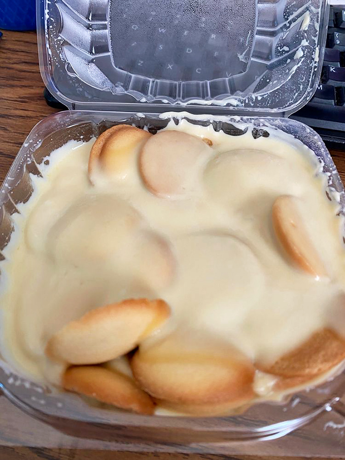 Banana pudding with vanilla wafers peeking through like treasure in a creamy sea. Dessert or art? Both.
