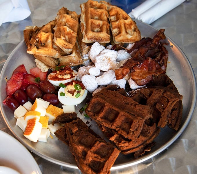 The Bentley of breakfast boards&mdash;waffles, bacon, fruit, and more. It's not just a meal; it's a morning celebration on a silver platter.