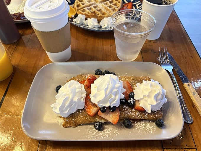 Berry-topped crepes with clouds of whipped cream&mdash;because sometimes breakfast should feel like you're getting away with something naughty.