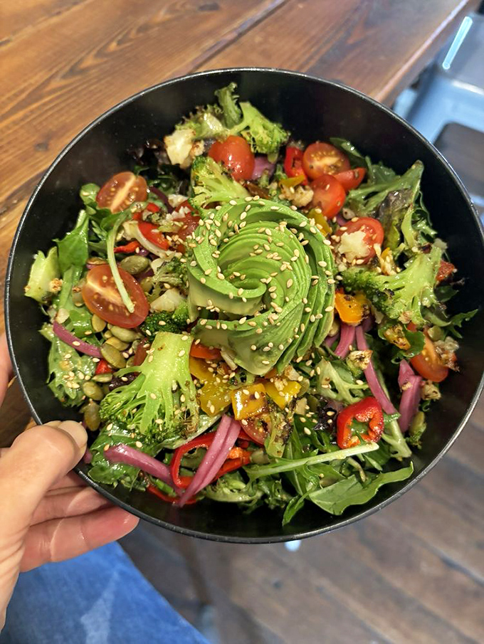 A salad so vibrant it practically photosynthesizes on your plate. Those avocado slices are the green jewels in this nutritious crown.