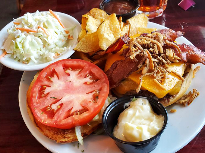 A burger that defies gravity with its towering toppings&mdash;proof that landlubbers can find happiness at a seafood joint after all.