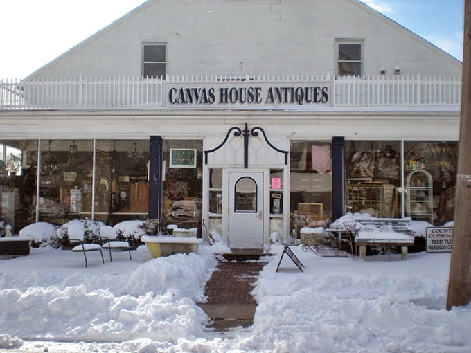 Canvas House Antiques stands resilient against winter snow, proving Point Pleasant's charm isn't just a summer fling. Year-round character at bargain prices.