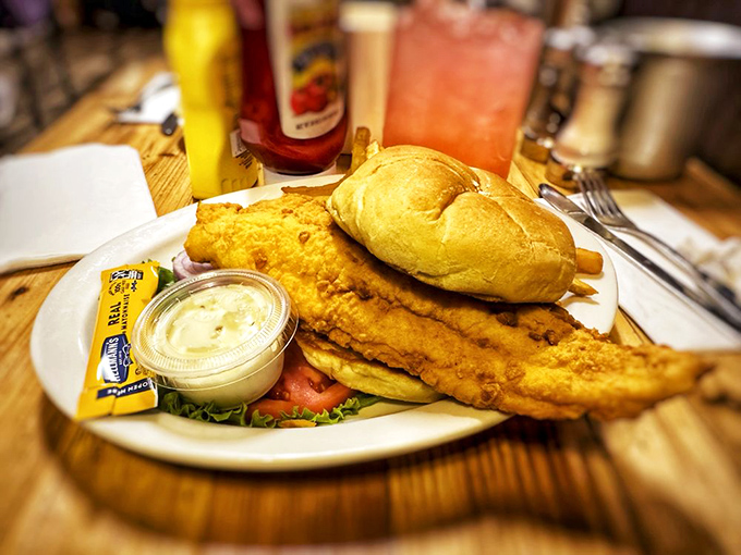 This catfish sandwich isn't trying to impress food critics – it's too busy making regular folks' lunch breaks something to look forward to.