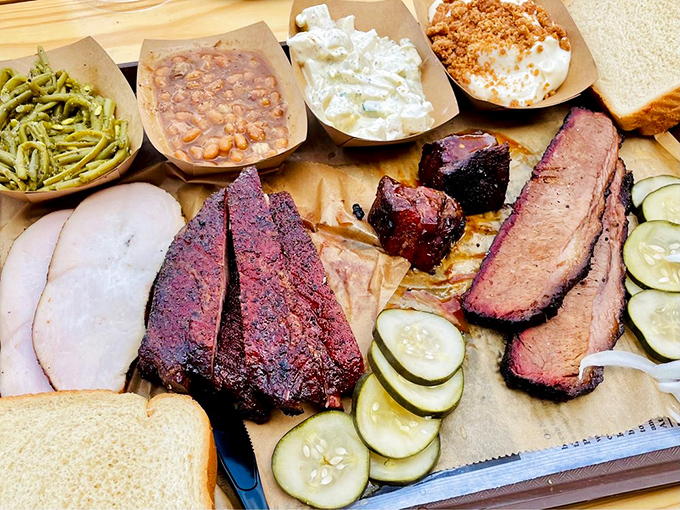 A BBQ spread that would make a vegetarian weep—brisket, ribs, and sides that don't know they're supposed to be supporting players in this meaty blockbuster.