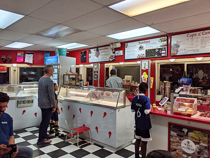 The counter at Wall's is where dreams and reality meet, with customers contemplating life's most important question: one scoop or two?