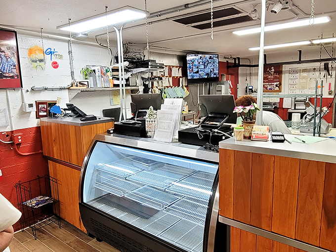 Behind this counter, barbecue magic happens. It's like Willy Wonka's factory, but for meat lovers.