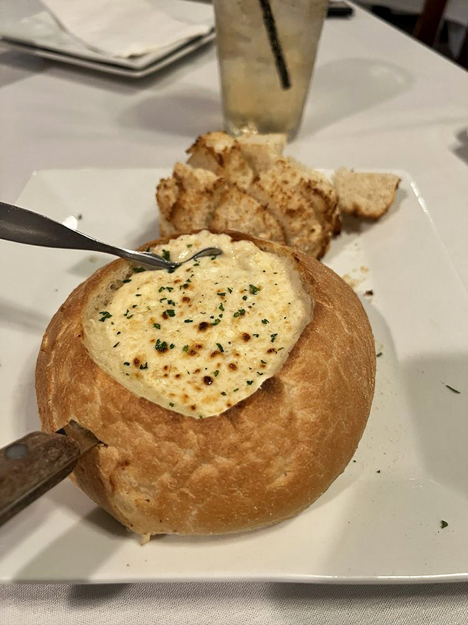 Bread bowl crab dip: Where Maryland tradition meets comfort food innovation in a warm, cheesy embrace you won't want to end.