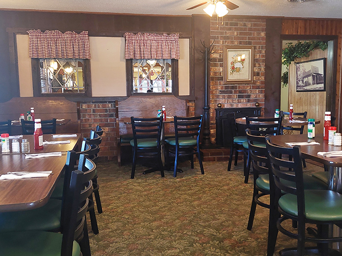 Red-checkered curtains and wood paneling create the timeless backdrop for thousands of "best meal I ever had" declarations.