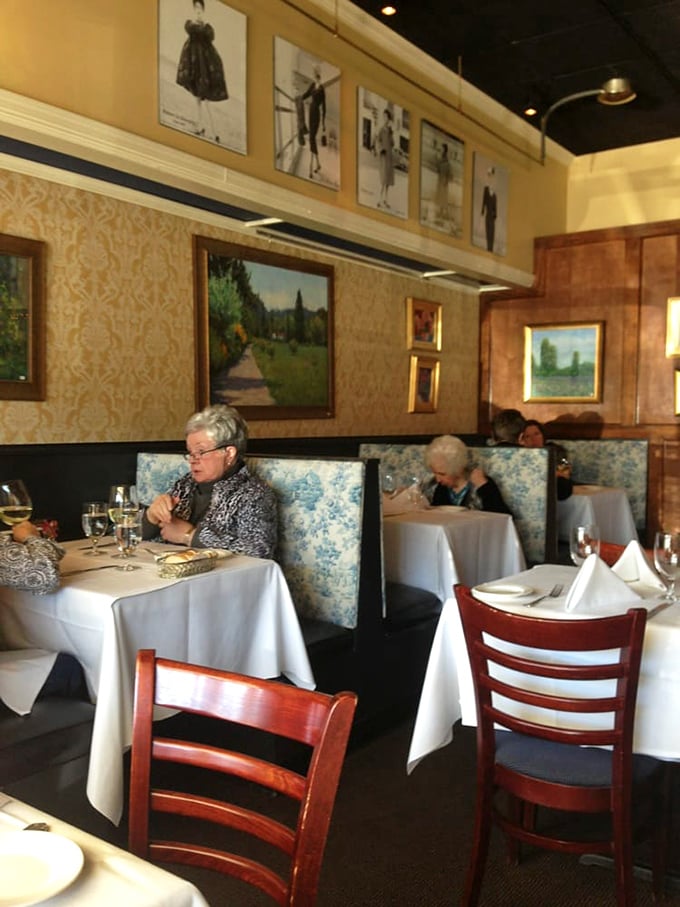 Blue toile banquettes and carefully curated artwork transport diners to a Parisian bistro&mdash;no passport required, just a healthy appetite and dinner reservation.