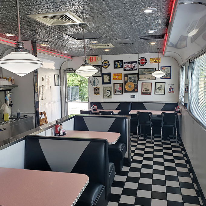 Pink tables, black booths, and that iconic checkerboard floor create the perfect backdrop for making memories over meals. Nostalgia never looked so appetizing.