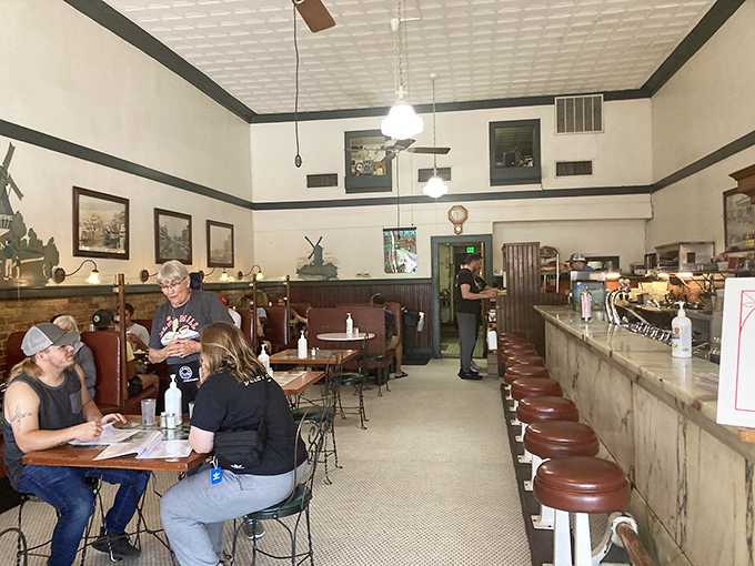 The dining area feels like grandma's kitchen got an upgrade. Those ceiling fans have been circulating stories and laughter for generations.