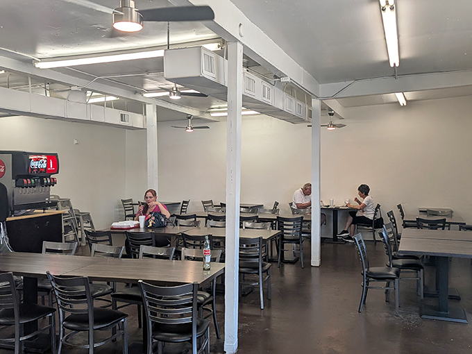 The dining room's utilitarian charm says, "We put our energy into the food, not the furniture." And nobody's ever complained about that priority.