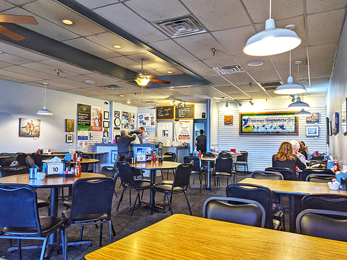 The dining area's warm lighting and simple tables create that "everybody knows your name" feeling that chain restaurants spend millions trying to fake.