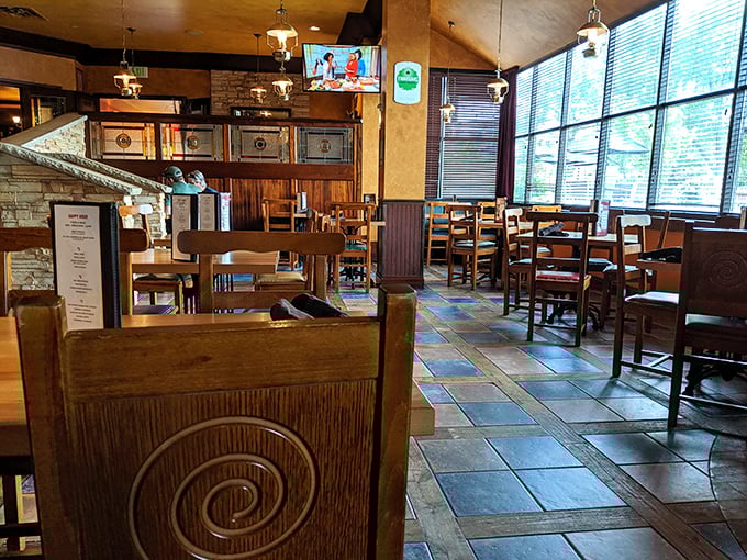 The dining area's warm wood and colorful tile floor create the perfect backdrop for conversations that somehow always last longer than planned.