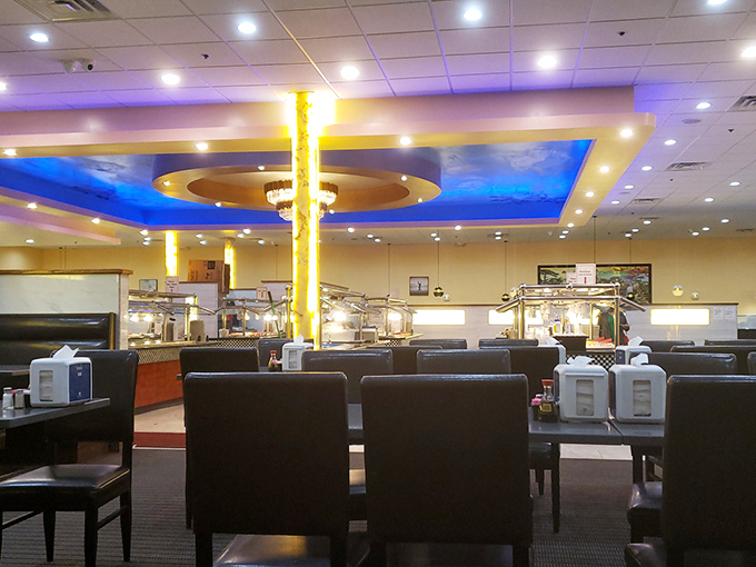 The dining area blends comfort with efficiency, where the blue-sky ceiling detail and golden pillars create an atmosphere that says, "Take your time, but remember&mdash;other hungry people are waiting."