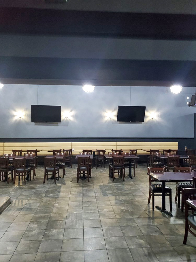 The dining area balances modern chic with comfortable warmth, creating the perfect backdrop for food that demands your full attention.