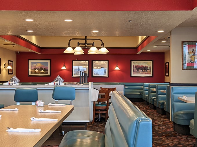 Red accent walls, landscape paintings, and booths designed for lingering conversations&mdash;this is where memories are made between coffee refills.