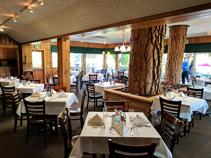 White tablecloths and those famous ponderosa pines create a dining room that balances rustic charm with just enough elegance for special occasions.