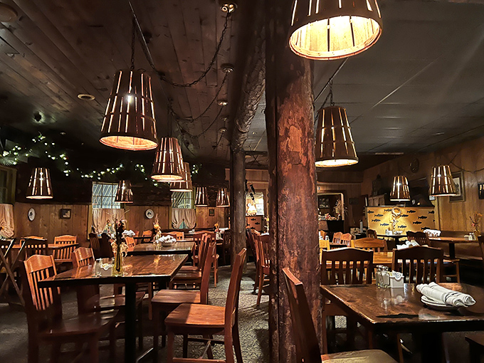 The dining room's distinctive barrel lampshades cast a warm glow over wooden tables, creating the perfect lighting for both romance and serious seafood consumption.