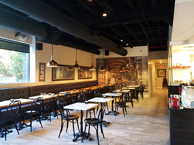 The dining area channels Parisian bistro vibes with classic caf&eacute; chairs and vintage photographs &ndash; where lingering is practically mandatory.