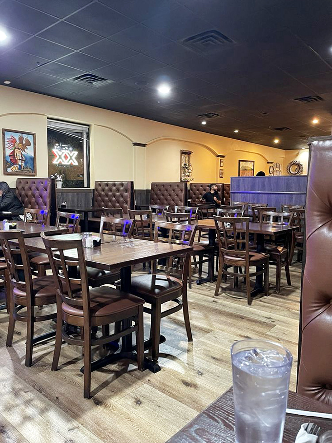 The dining room's warm wood tones and cushioned booths invite you to settle in. This isn't a "rush you out" restaurant&mdash;it's a "stay awhile" kind of place.