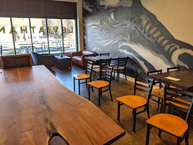 The communal table and mural create a space that says, "Stay awhile, we've got stories to tell." Modern day salon meets carb sanctuary.