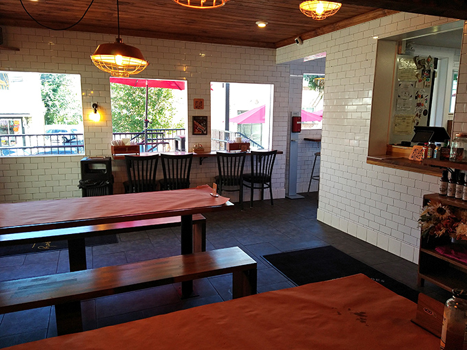 White subway tiles meet wooden ceilings in this bright, airy space where the only thing more inviting than the d&eacute;cor is the menu. 