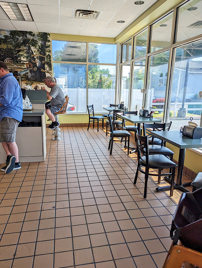 The sunny dining area offers prime people-watching while you contemplate ordering "just one more" from the display case. 