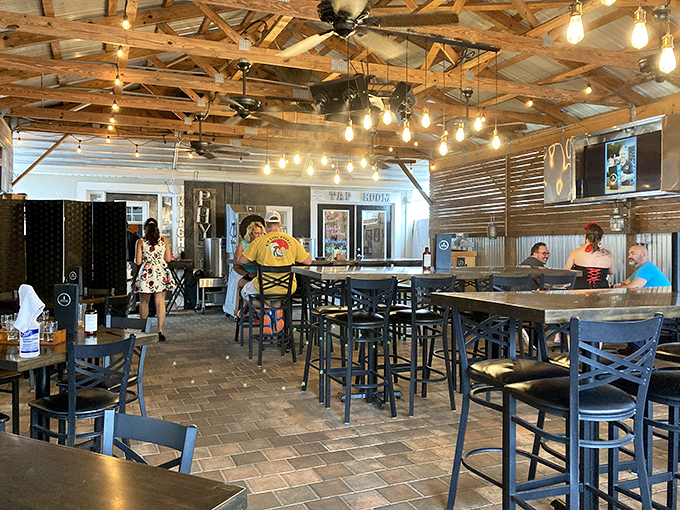 The dining area balances rustic charm with casual elegance. String lights create a warm glow that makes everyone look like they're starring in their own food documentary.